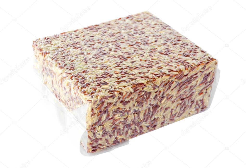 Brown rice in vacuum plastic bag. Stock Photo by ©gamjai 67954743