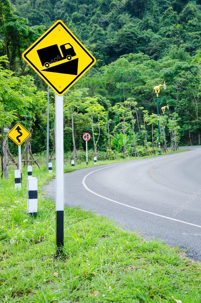 Steep grade hill traffic sign on road. — Stock Photo © gamjai #79698100