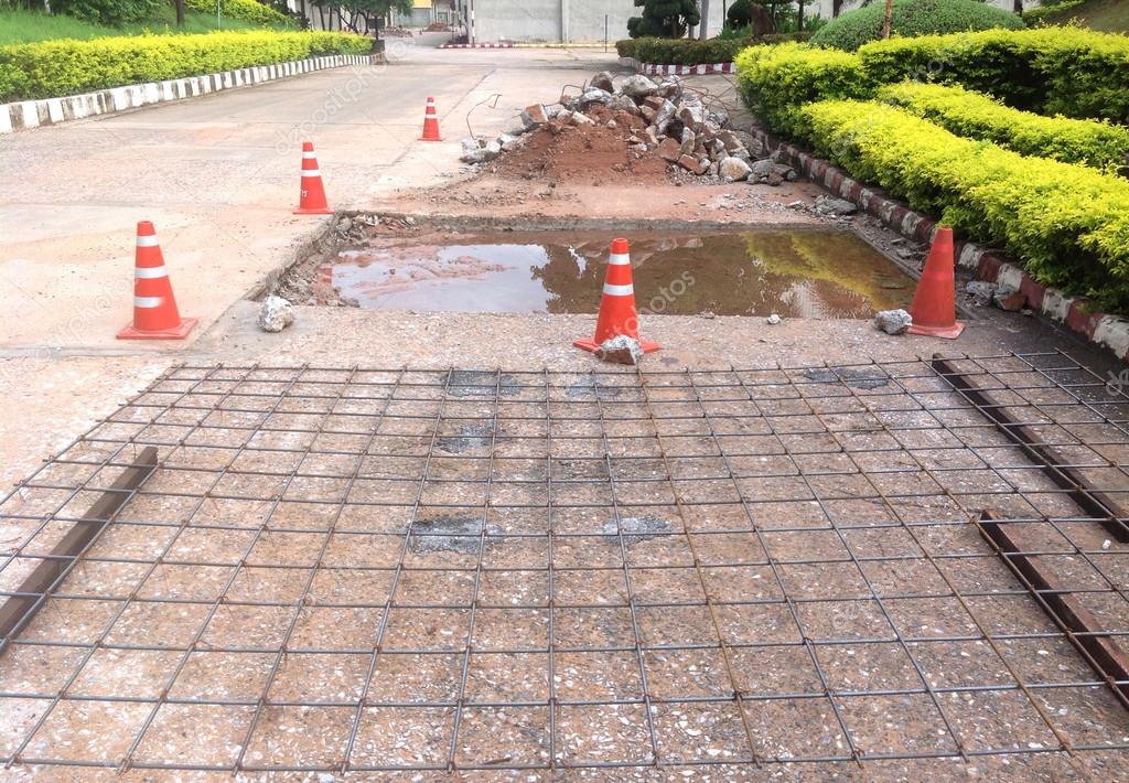 Pothole and road surface repairing works — Stock Photo © koko-tewan ...