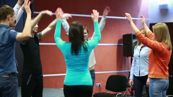 Team building, group discussion or therapy. people perform an exercise ...