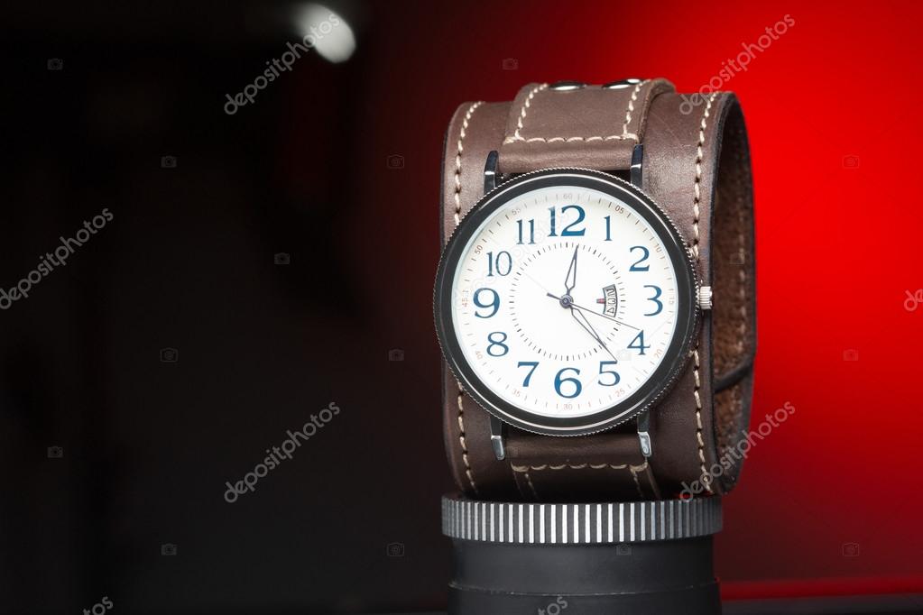Mens watches with wide leather bracelet Stock Photo by ©kopitin 68334075