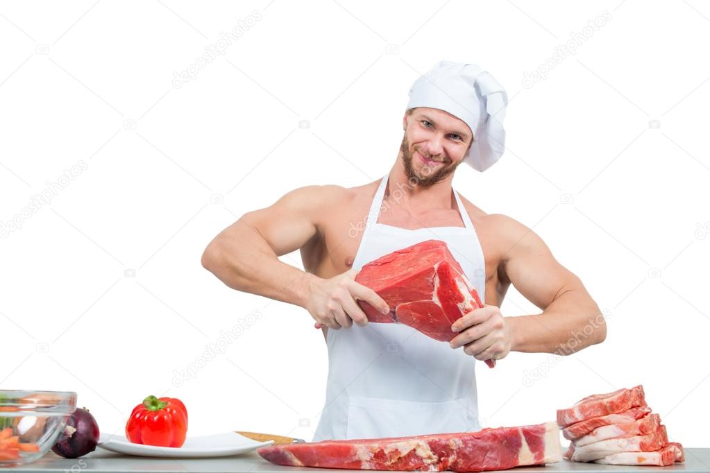 Chef bodybuilder preparing large chunks of raw meat. Stock Photo by ...