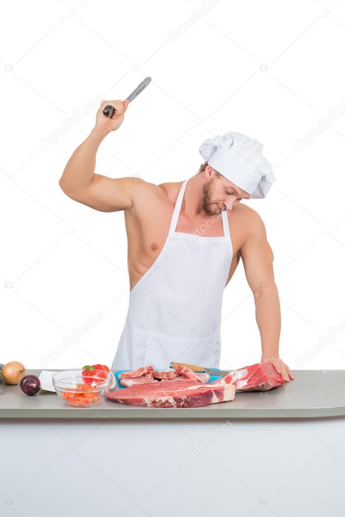 Chef bodybuilder preparing large chunks of raw meat. — Stock Photo ...