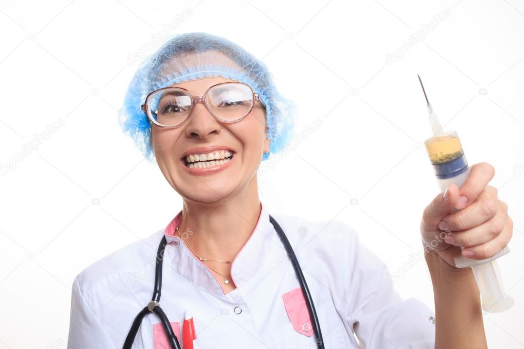 Evil doctor with big syringe Stock Photo by ©kopitin 86833574
