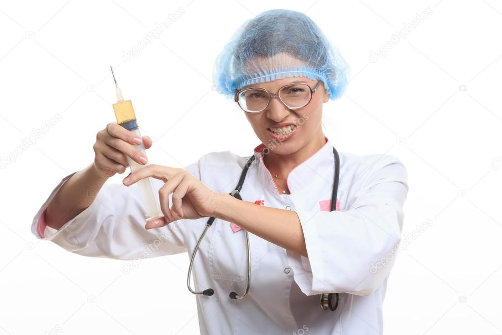 Evil doctor with big syringe Stock Photo by ©kopitin 86833748