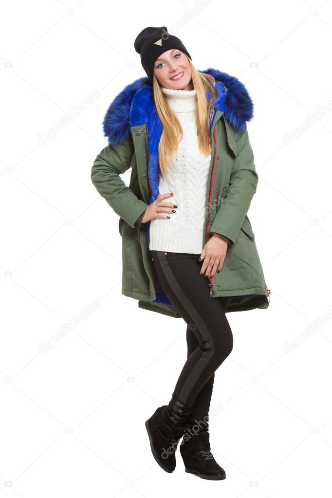 Woman wearing winter jacket scarf and cap — Stock Photo © kopitin #90221566