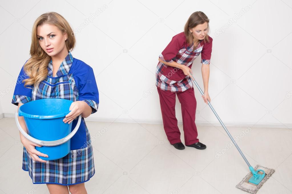 Two different cleaners compete. poor staff. wash the floor, clean ...