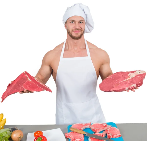 Chef bodybuilder preparing large chunks of raw meat. — Stock Photo ...
