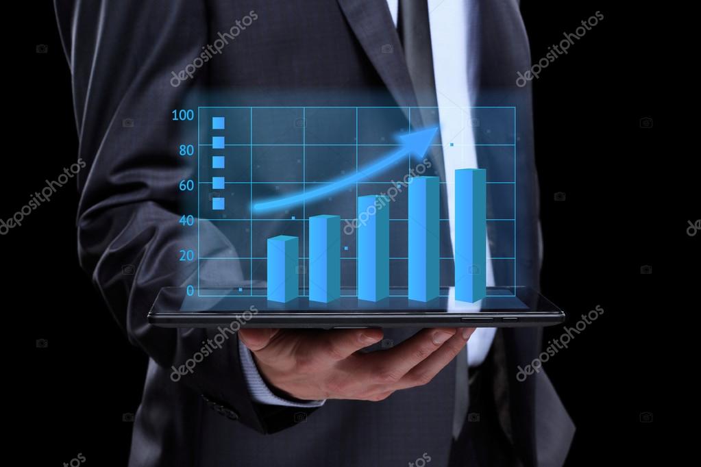 Usinessmen, hand touch screen graph on a tablet Stock Photo by ©kopitin 97237664