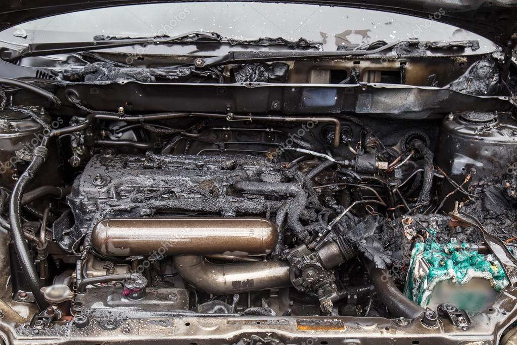 Car engine burned Stock Photo by ©PhanuwatNandee 57379857