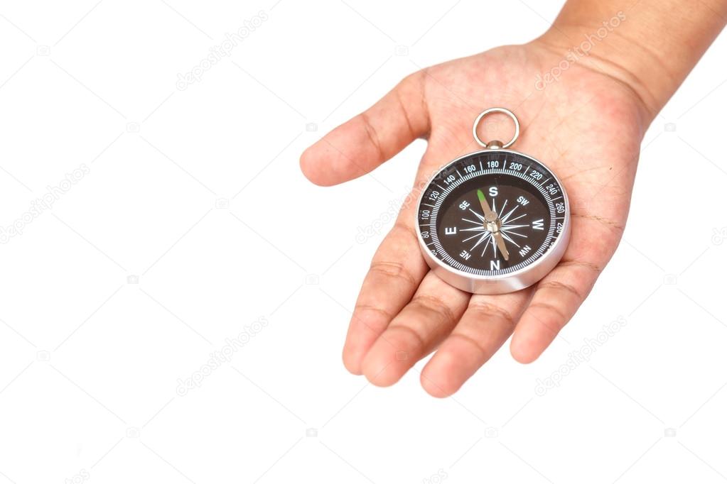 Black compass in hand Stock Photo by ©PhanuwatNandee 60895805