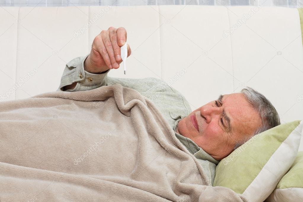 Old man has fever Stock Photo by ©inesbazdar 105377892