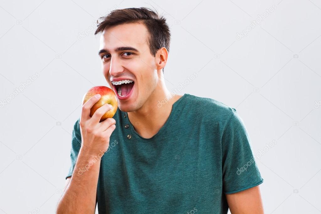 Humans Eating An Apple