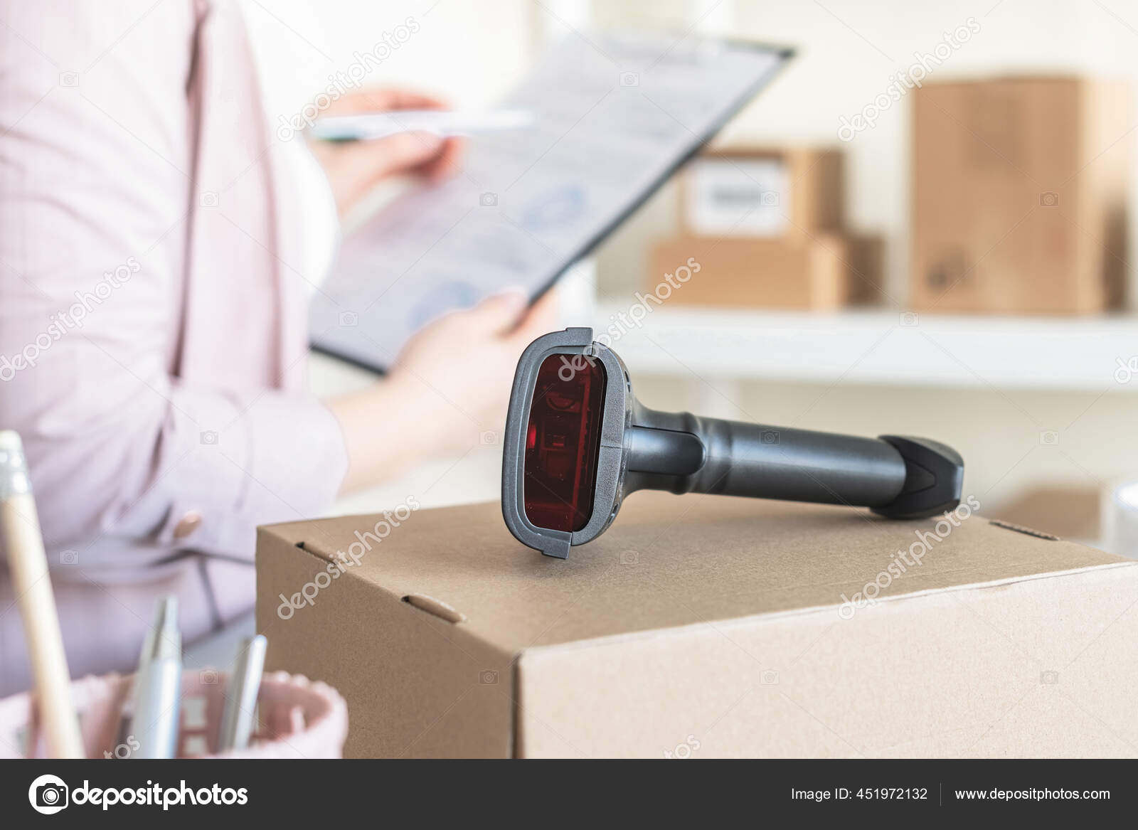 Woman Employee Post Office Scanning Parcel Using Barcode Scanner ...