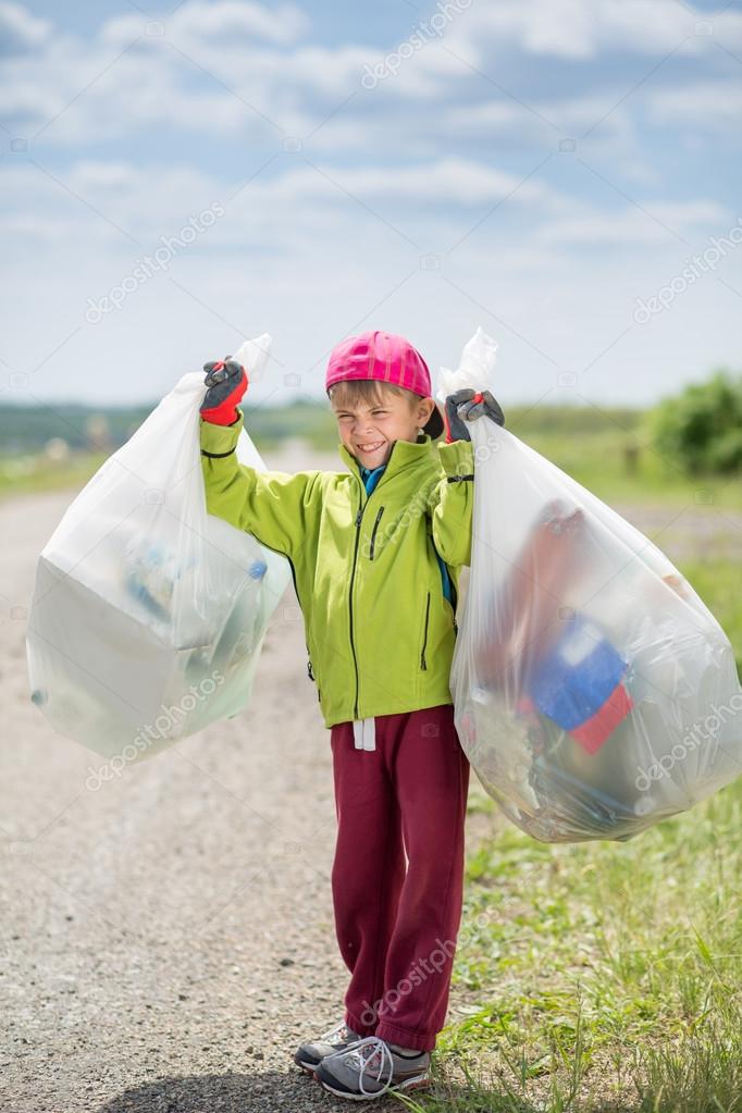 Boy picking up trash | Boy picking up trash — Stock Photo © PEPPERSMINT ... Boy picking up trash | Boy picking up trash — Stock Photo © PEPPERSMINT ...