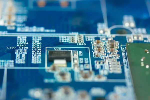 The reverse side of the microboard on a blue background. Electronic ...