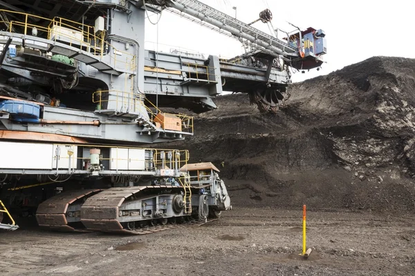 Coal mining in opencast mine Stock Photo by ©Tylinek 82911864