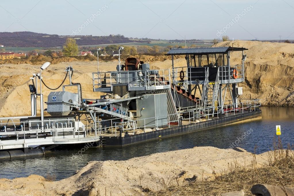 Large machines for sand mining — Stock Photo © Tylinek #88648558