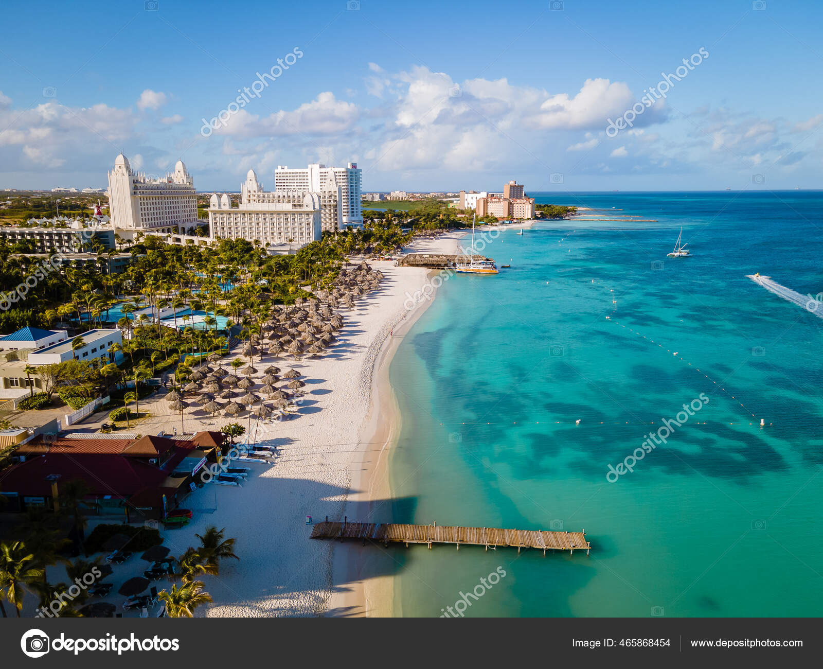 Palm beach Aruba Caribbean, white long sandy beach with palm trees at ...