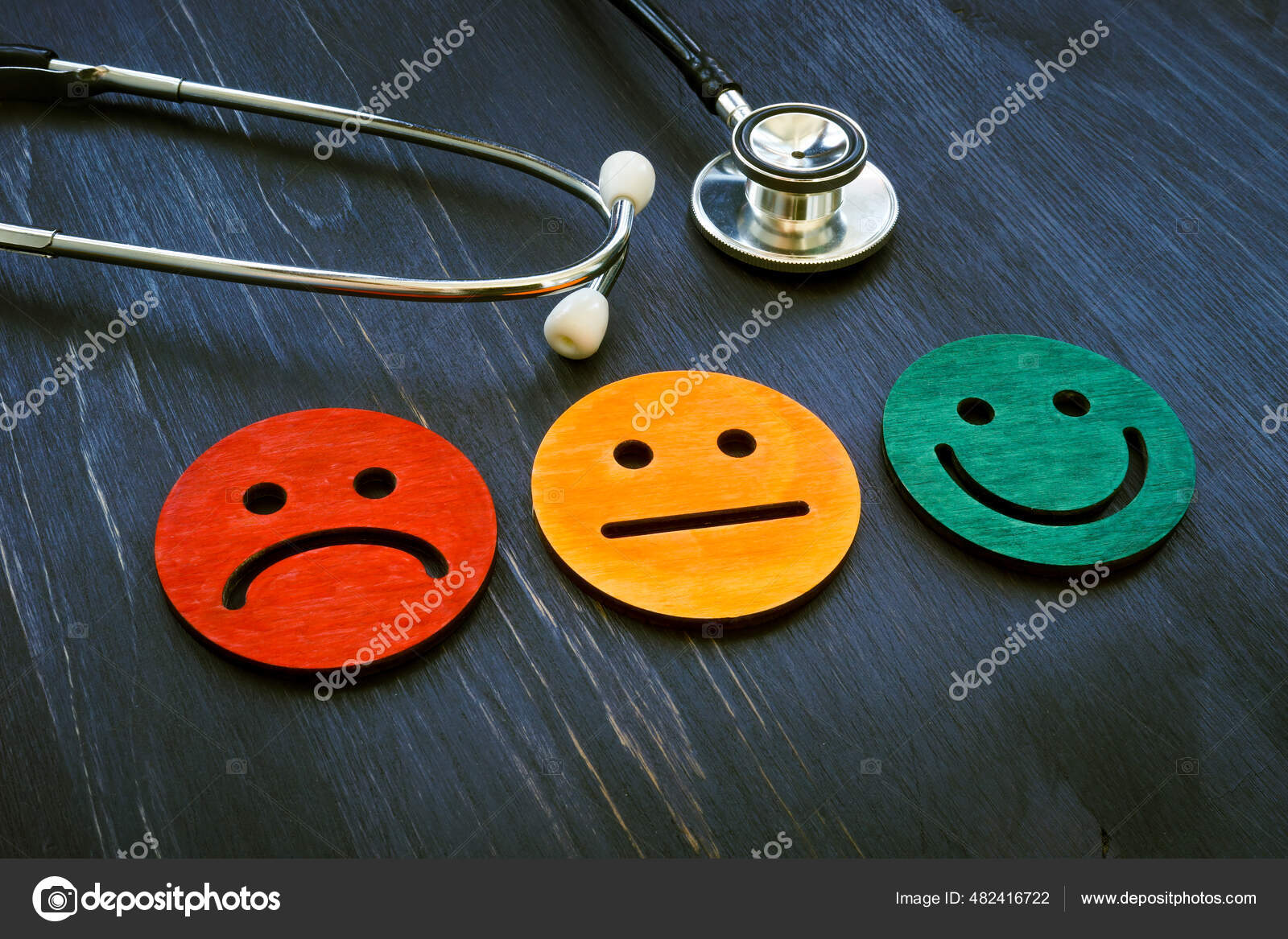 Patient experience concept. Stethoscope and smiled faces for hospital ...