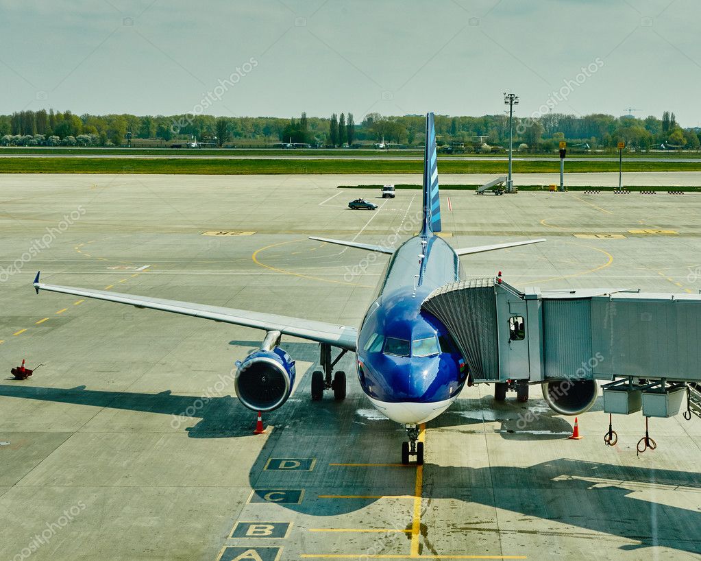 Airplane at the terminal gate ready for takeoff Stock Photo by ...