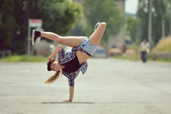 Young girl dancing breakdance on the street — Stock Photo © davidtb ...