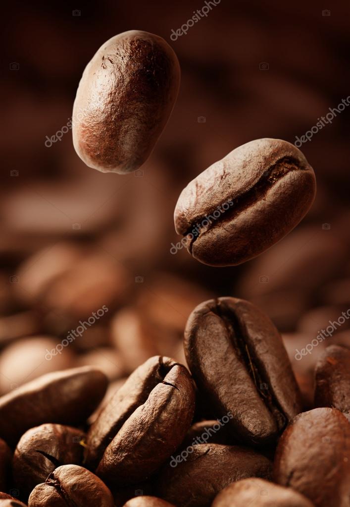 Spilled coffee beans — Stock Photo © erryan #67925779