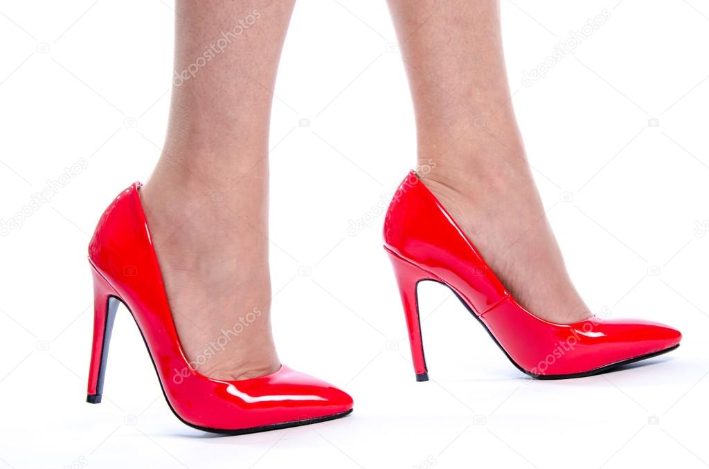 Woman wearing red high heel shoes — Stock Photo © thodonal #60561289