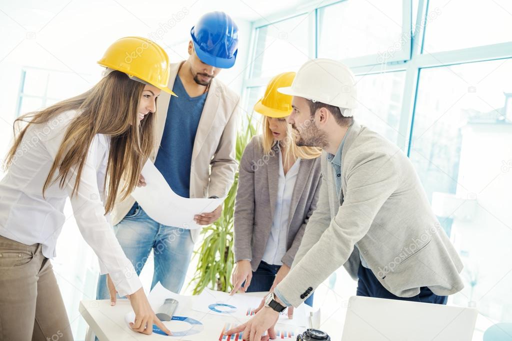Construction workers in office Stock Photo by ©Ivanko1980 121083740