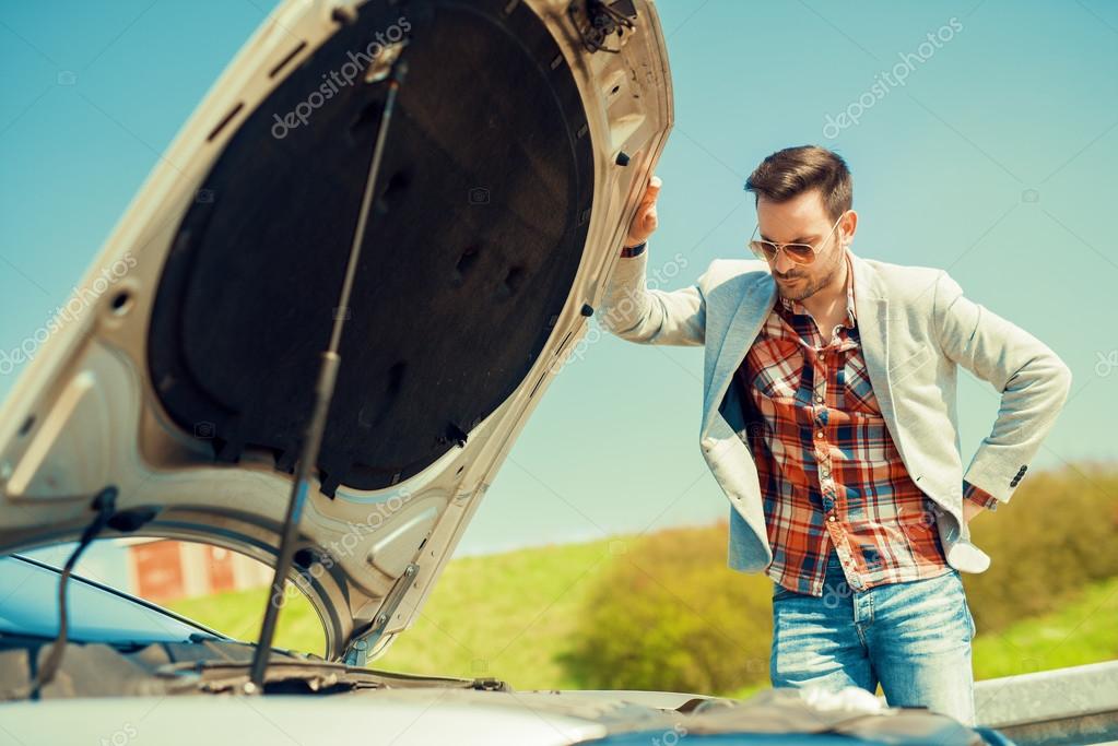 Men having problem with car. Stock Photo by ©Ivanko1980 121088176