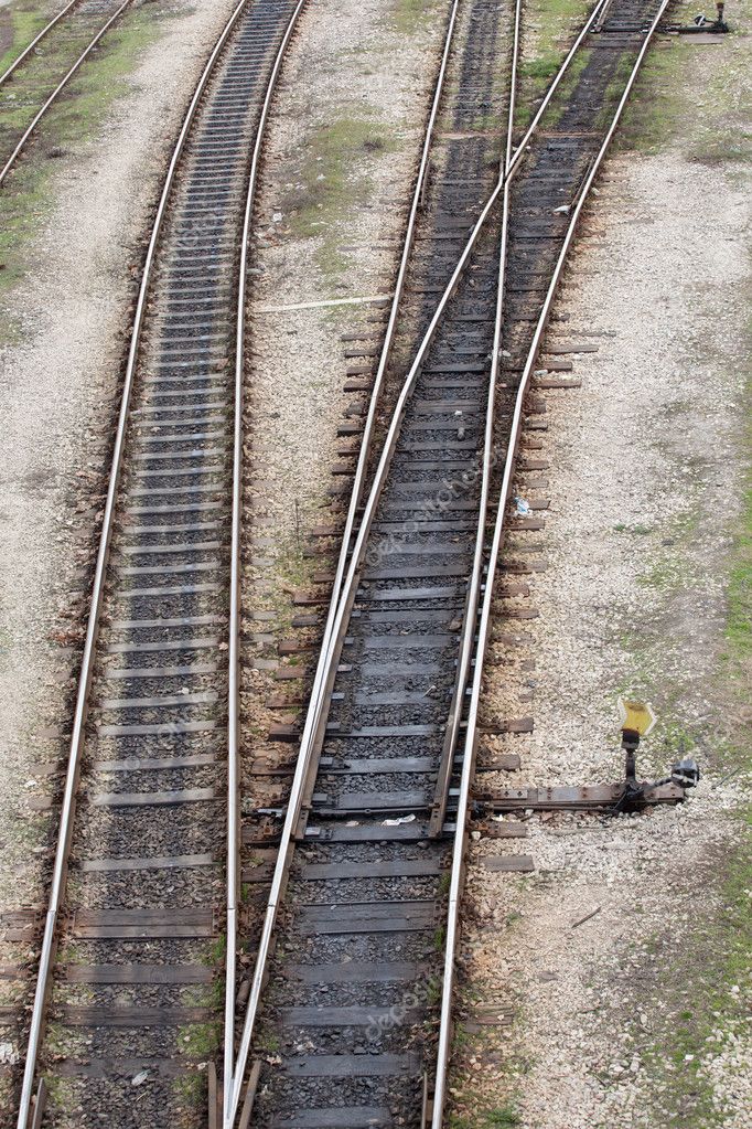 Railway tracks leading to different ways Stock Photo by ©dechevm 54909605