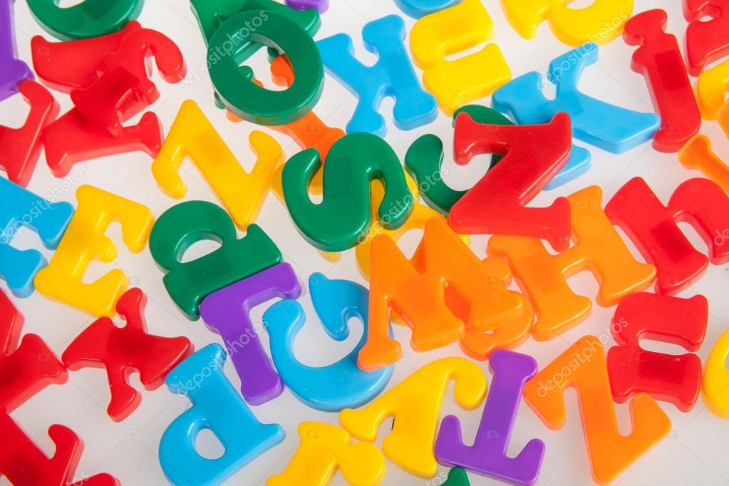 Multicolored plastic letters. Alphabet background Stock Photo by ...