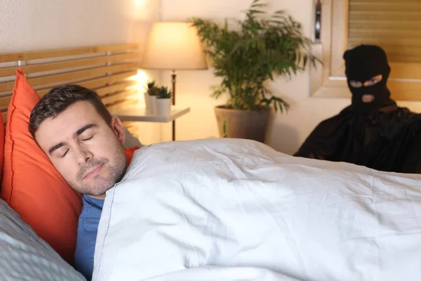 Handsome Young Man Lying Bed Home While Robber Sitting Background Stock ...