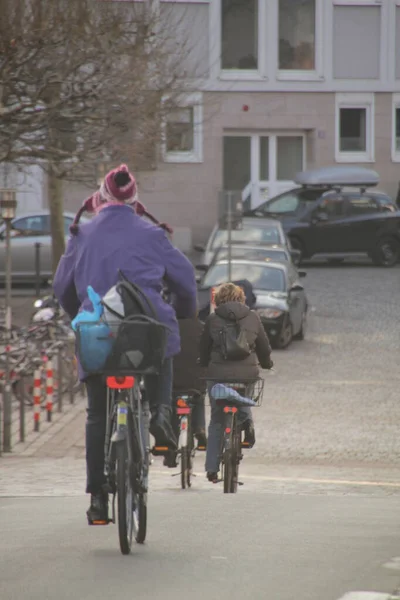 There are 10 people from a poor family riding on one bicycle fotos de ...
