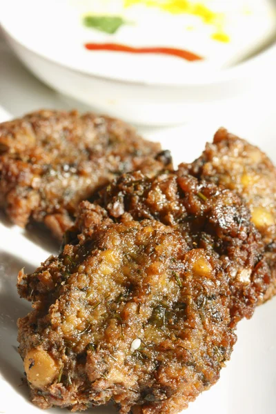 Masala Vadas - A popular South Indian deep fried crisp snack. - Stock ...