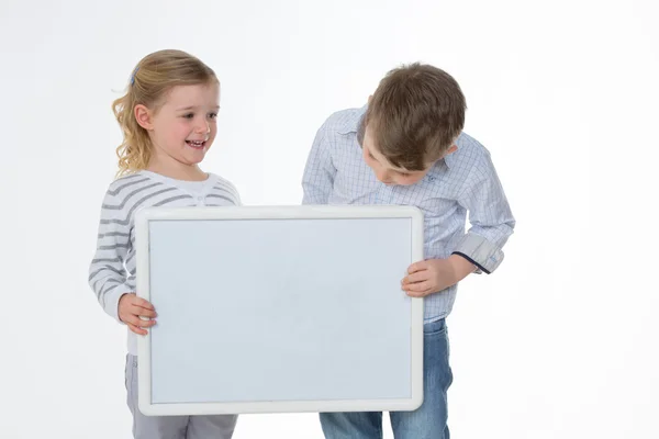 Children holding whiteboard Stock Photos, Royalty Free Children holding ...