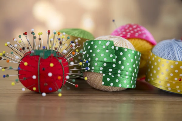 Sewing kit. Colored thread, pins, buttons, ribbons, safety pin. — Stock ...
