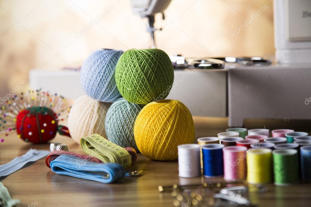 Sewing machine. Colorful threads, needles, pins, buttons. Stock Photo ...
