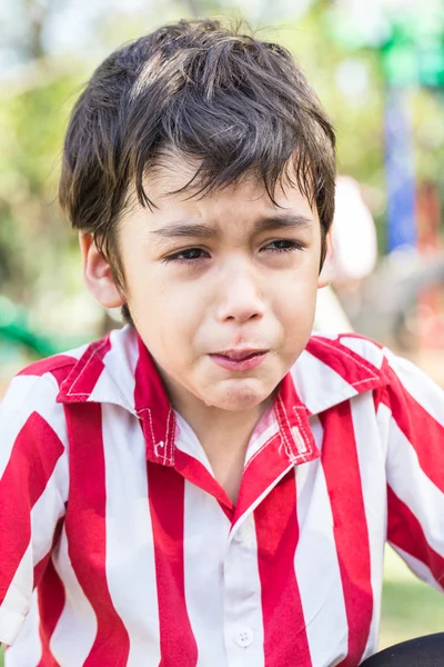 Little boy Bleeding at the mouth and mother help first aid to hi Stock ...