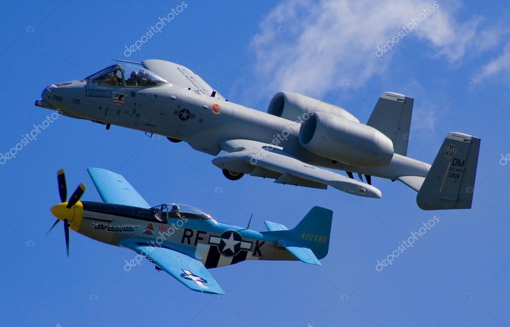 Two planes flying together — Stock Editorial Photo © photoquest7 #67943763