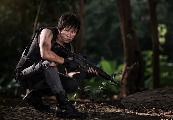 Special force with the gun in the jungle - Stock Image - Everypixel
