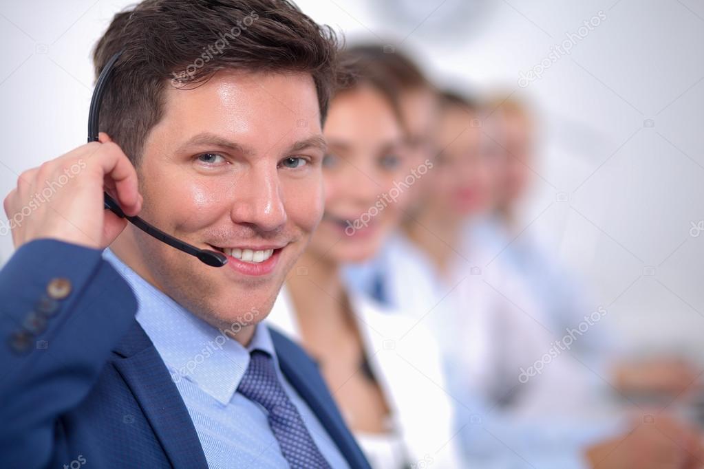 Attractive Smiling positive young businesspeople and colleagues in a ... Attractive Smiling positive young businesspeople and colleagues in a ...