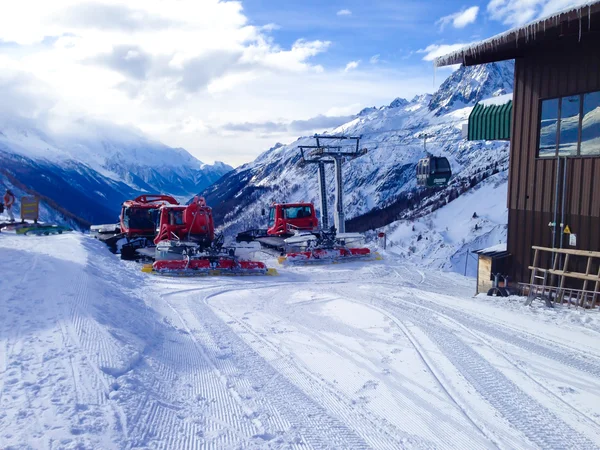 Red ratrack near ski route in mountains. Chamonix - Stock Image ...
