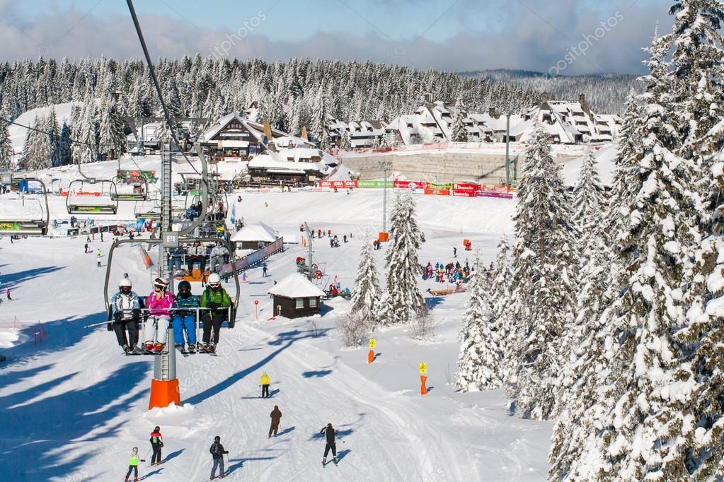 Ski resort Kopaonik, Serbia, people on the ski lift, mountains panorama ... Ski resort Kopaonik, Serbia, people on the ski lift, mountains panorama ...