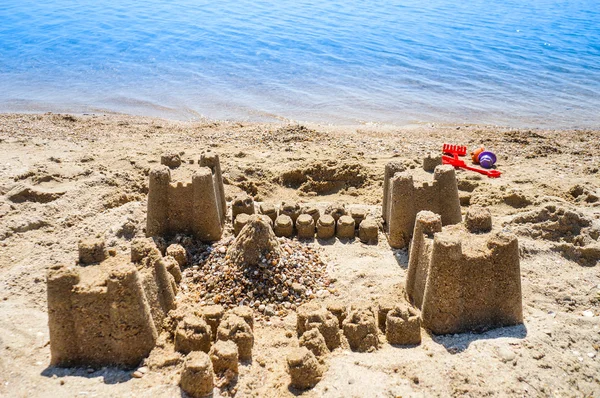Sand castle on the beach — Stock Photo © MitaStockImages #179353058