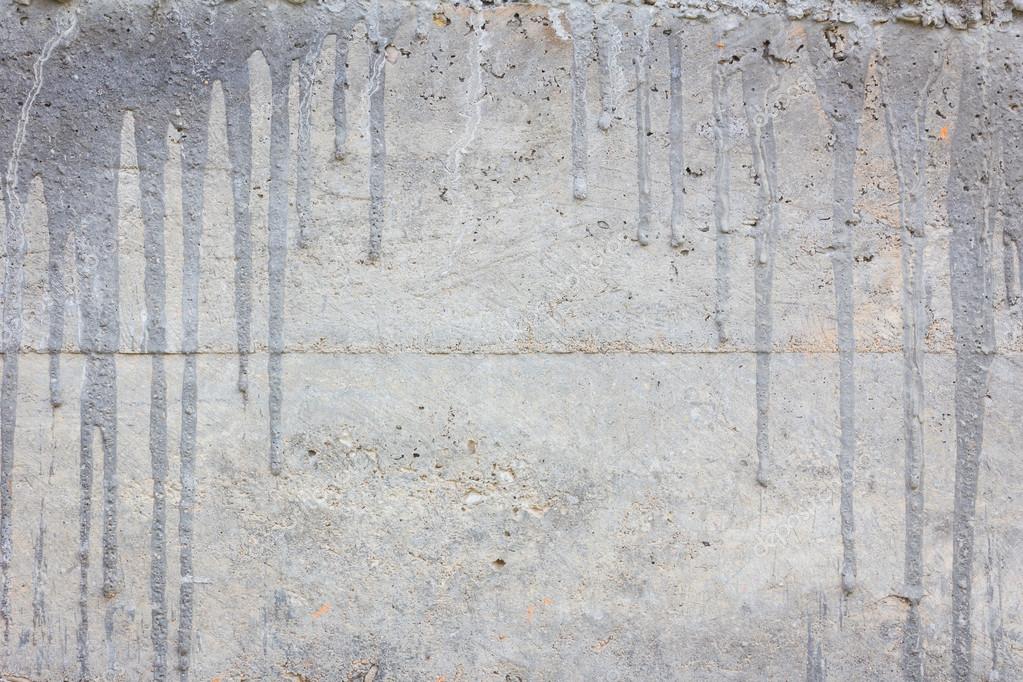 Concrete wall with cement drips and copyspace in the middle. — Stock ...
