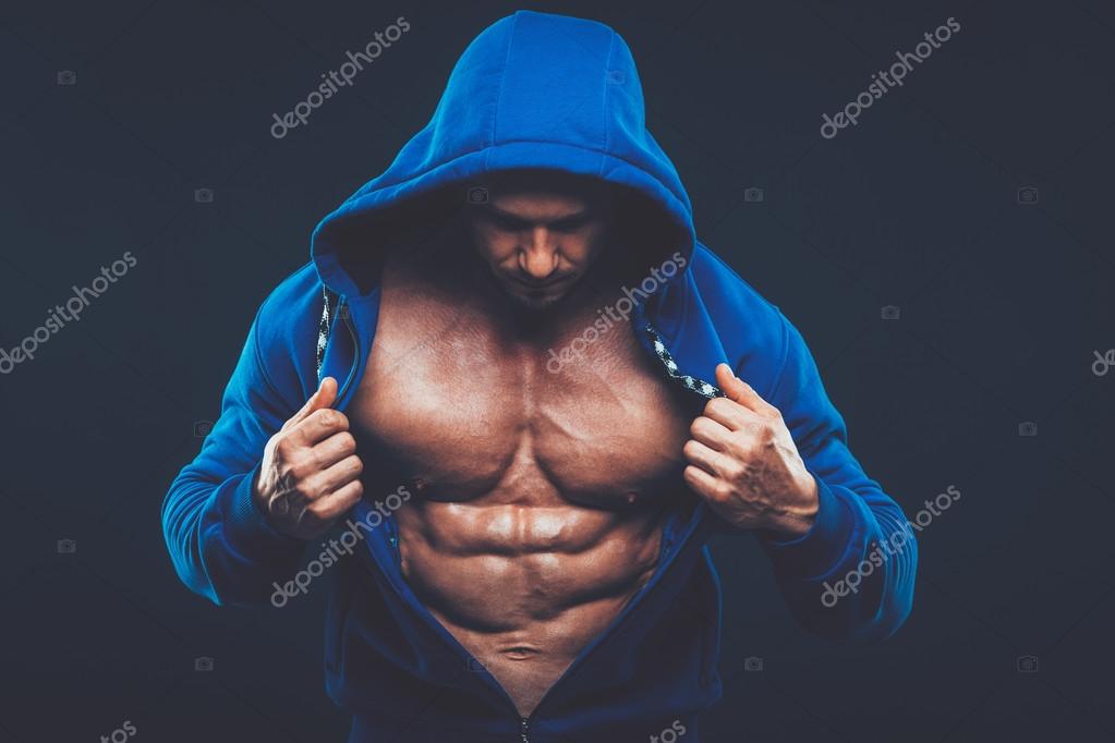Man with muscular torso. Strong Athletic Men Fitness Model Torso Stock ...