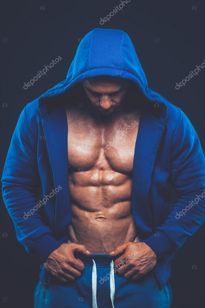 Man with muscular torso. Strong Athletic Men Fitness Model Torso ...