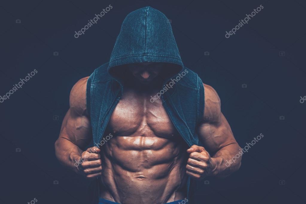 Man with muscular torso. Strong Athletic Men Fitness Model Torso ...