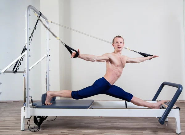 Pilates reformer man Stock Photos, Royalty Free Pilates reformer man ...